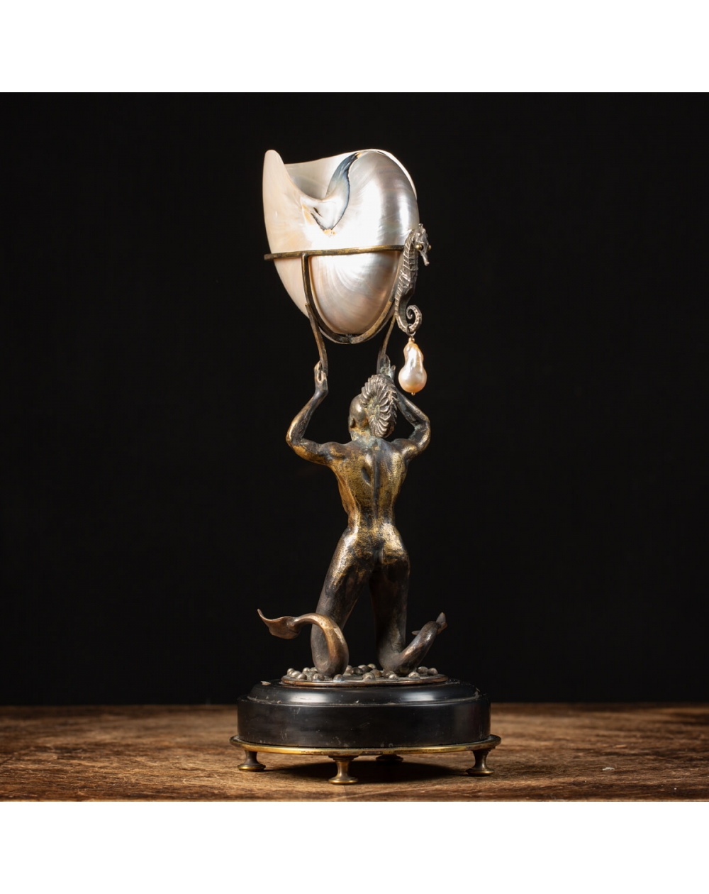 Triton Bronze Sculpture with Nautilus on an ancient marble base