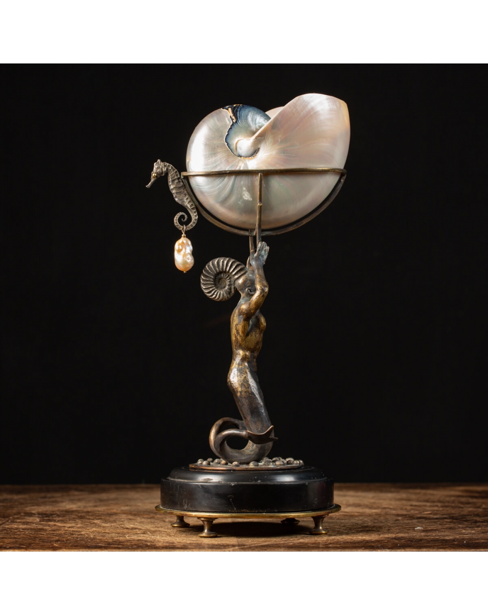 Triton Bronze Sculpture with Nautilus on an ancient marble base